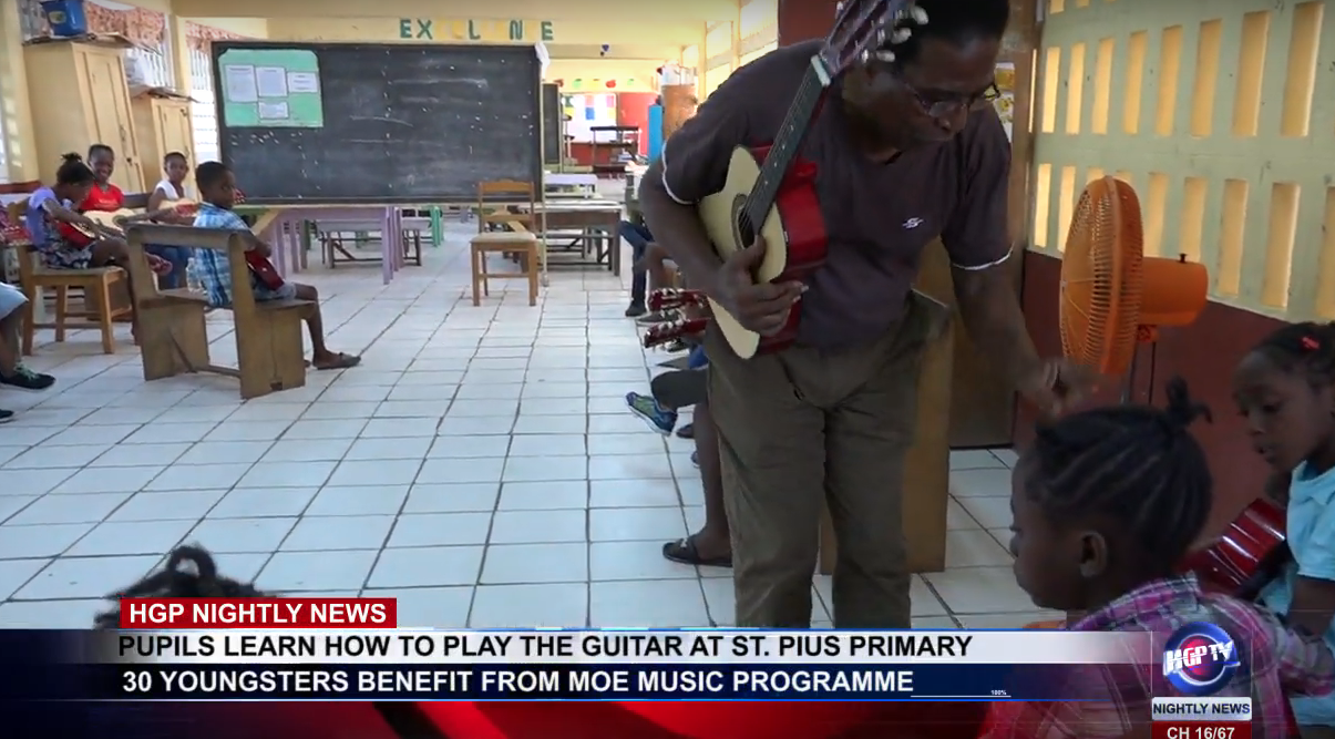 PUPILS LEARN HOW TO PLAY THE GUITAR AT-ST PIUS PRIMARY - HGP TV ...